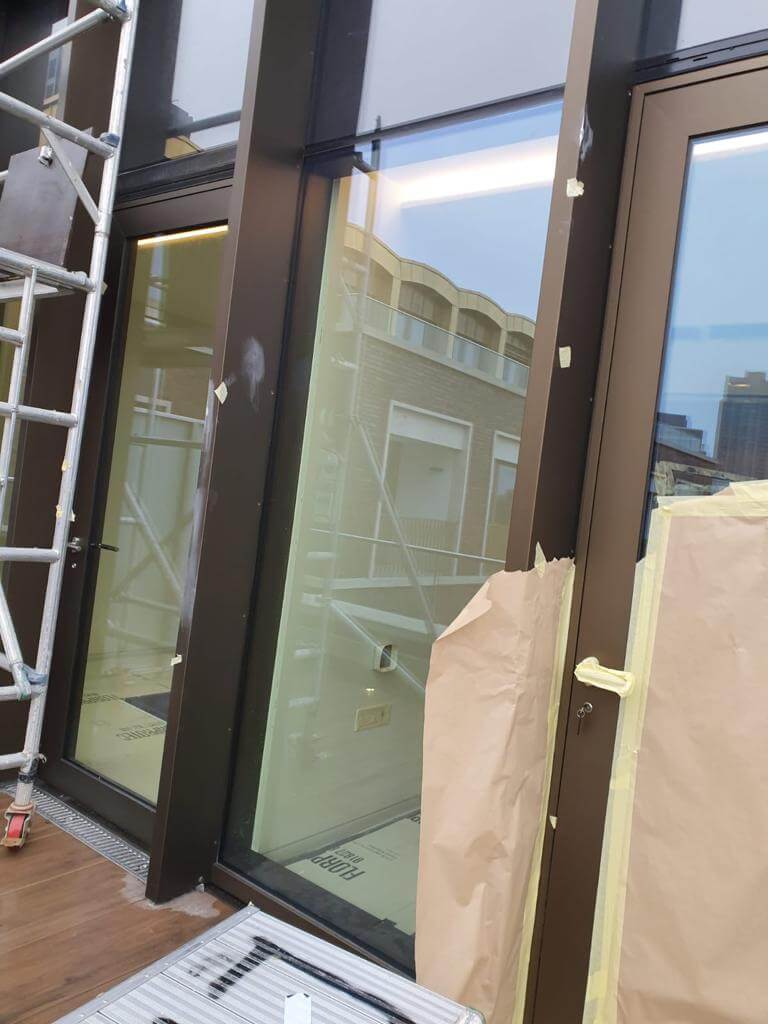 Barts Square- Curtain Wall System Repair and Respray