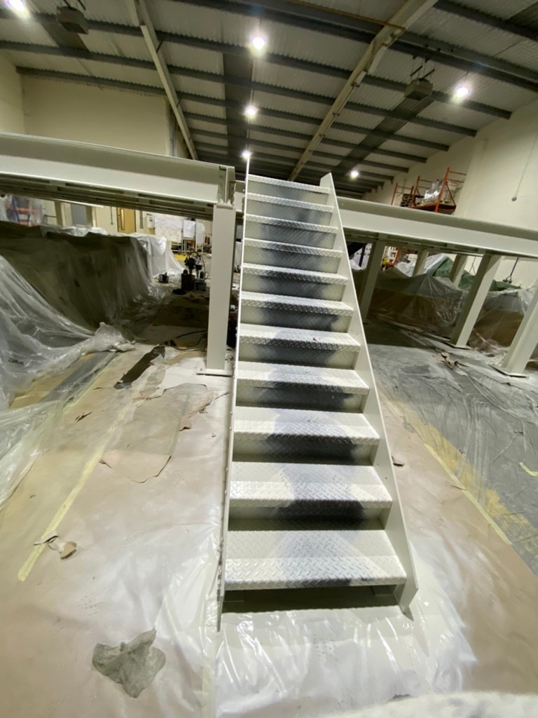 Spraying Warehouse Structural Steelwork - Just Spray Network